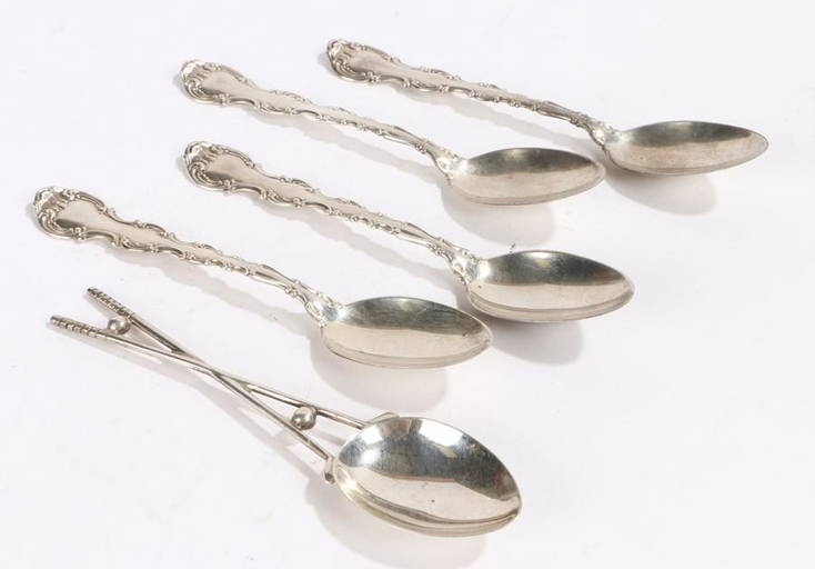 Four Sterling Silver Teaspoons With Scroll Cast