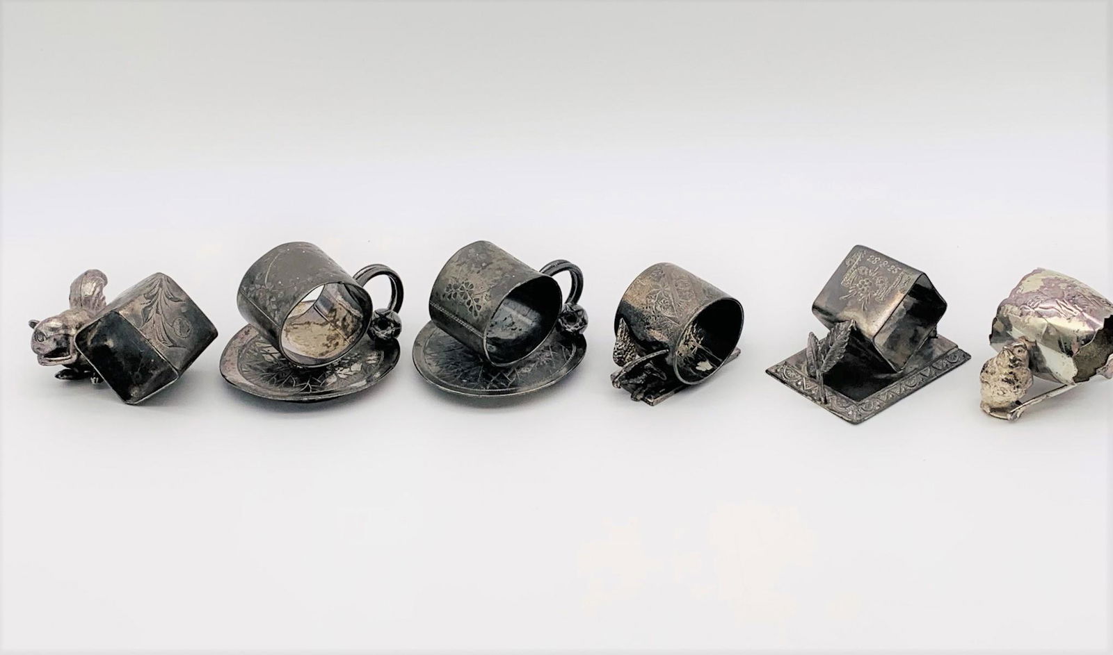 6 Victorian Silver Plate Figural Napkin Rings