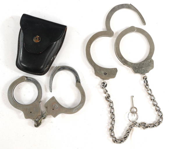The Peerless Handcuff Co. Leg Shackles & Handcuffs