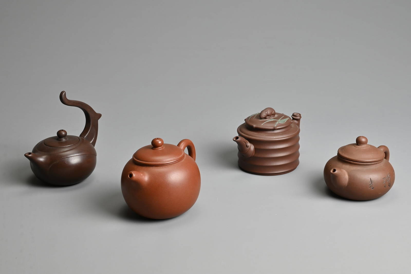 Four Chinese Yixing Pottery Teapots, 20th Century Or Later. Of Varying ...