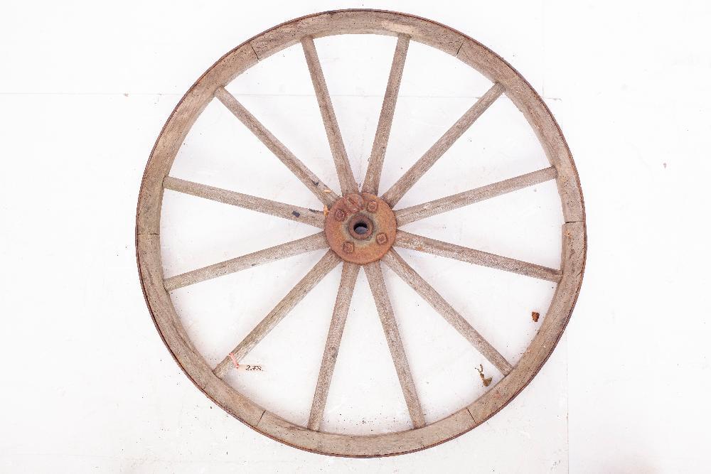 Rustic oak wagon wheel - Oct 18, 2019 | Vogt Auction Texas in TX