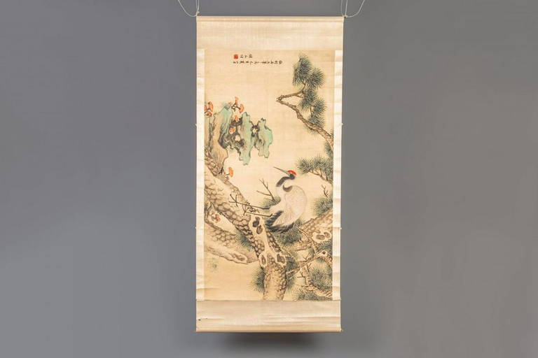 A Chinese Silk Scroll Painting With A Crane Among