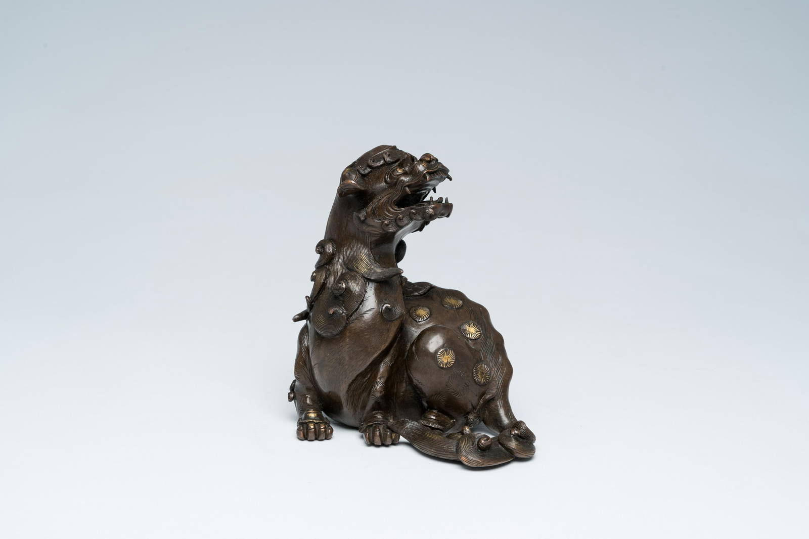 A Japanese Patinated Bronze Model Of A Shishi Lion, Signed Kiyotoshi ...