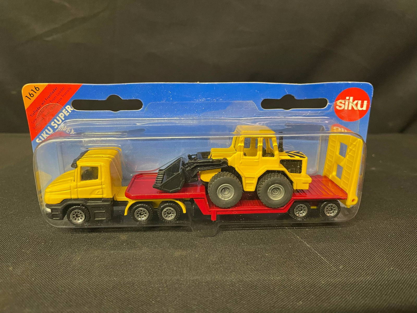 Siku Super 1616 Low-loader W/ Front Loader Auction