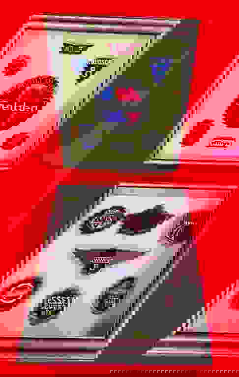 Lot: 14 Framed Early Car Emblems Auction