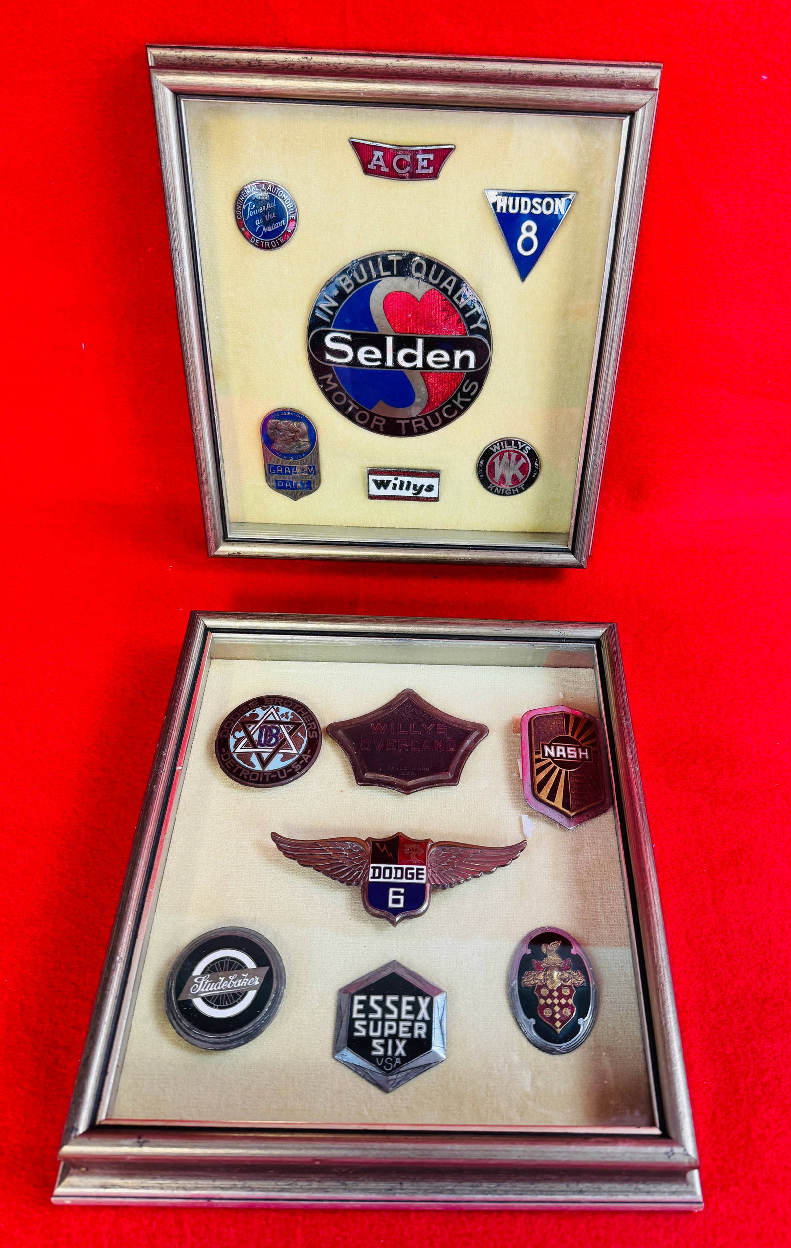 Lot: 14 Framed Early Car Emblems Auction