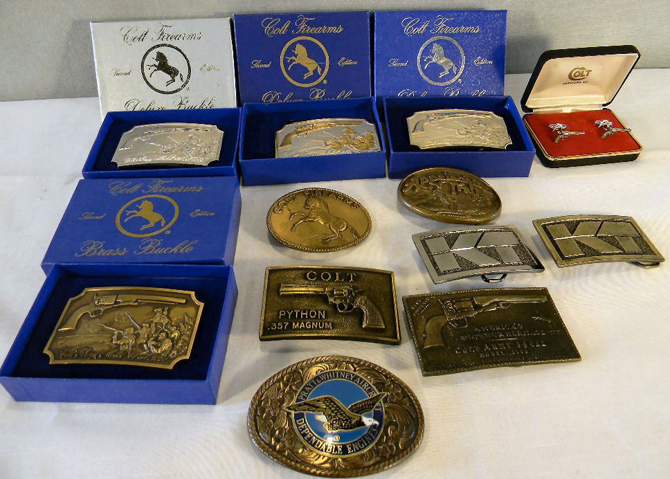 Lot of seven Colt Firearms belt buckles (four with orig