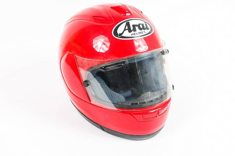 Full Face Red And Black Motorcycle Helmet By Arai.