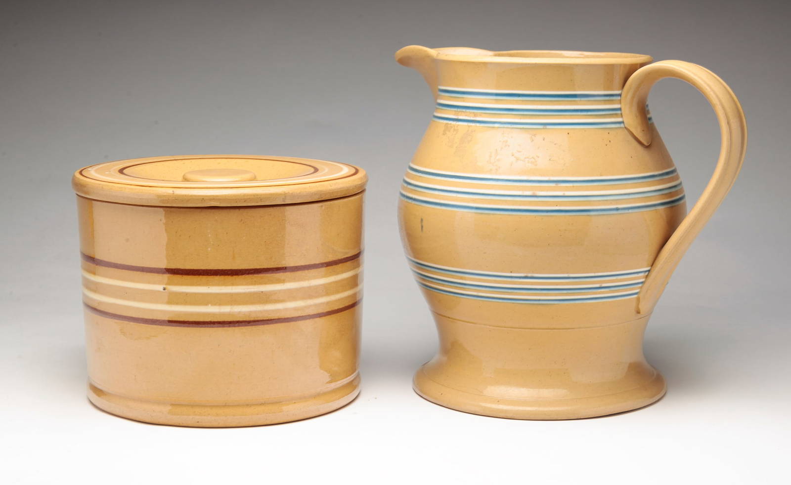 Two Yellow Ware Pieces With Banded Decoration. Auction
