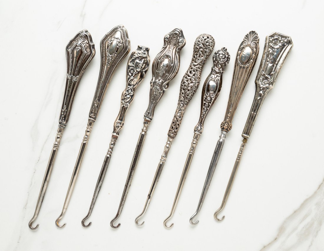 Eight Victorian Button Hooks. Auction
