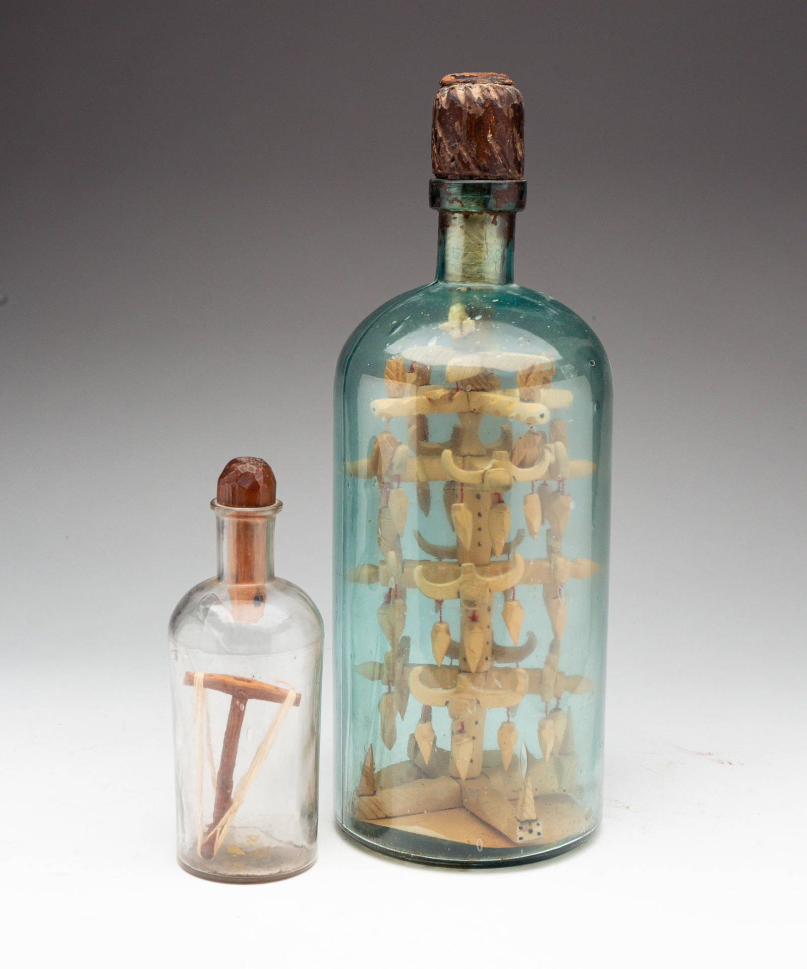 Two Folk Art Bottle Whimseys. Auction