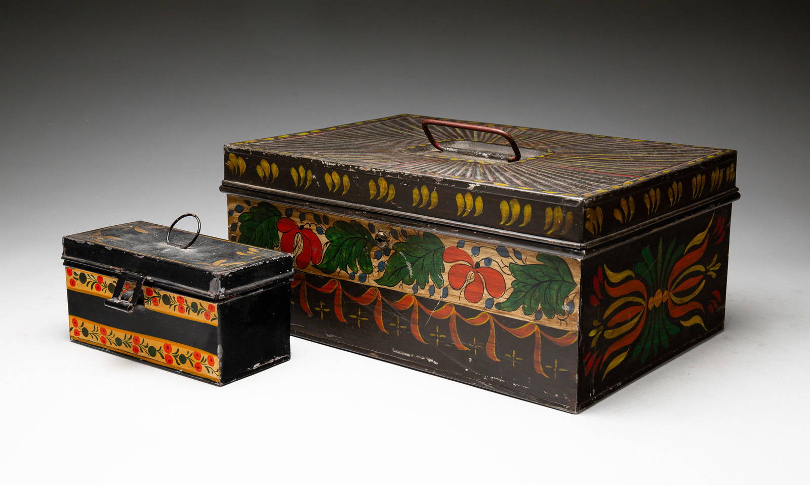 Two Tole Boxes. Auction