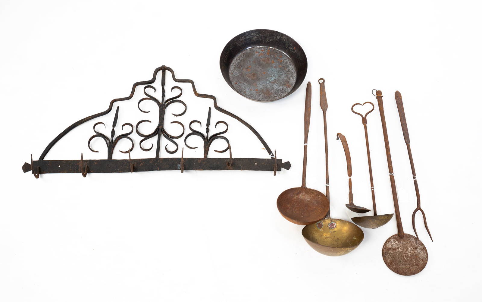 Wrought Iron Rack And Utensils. Auction
