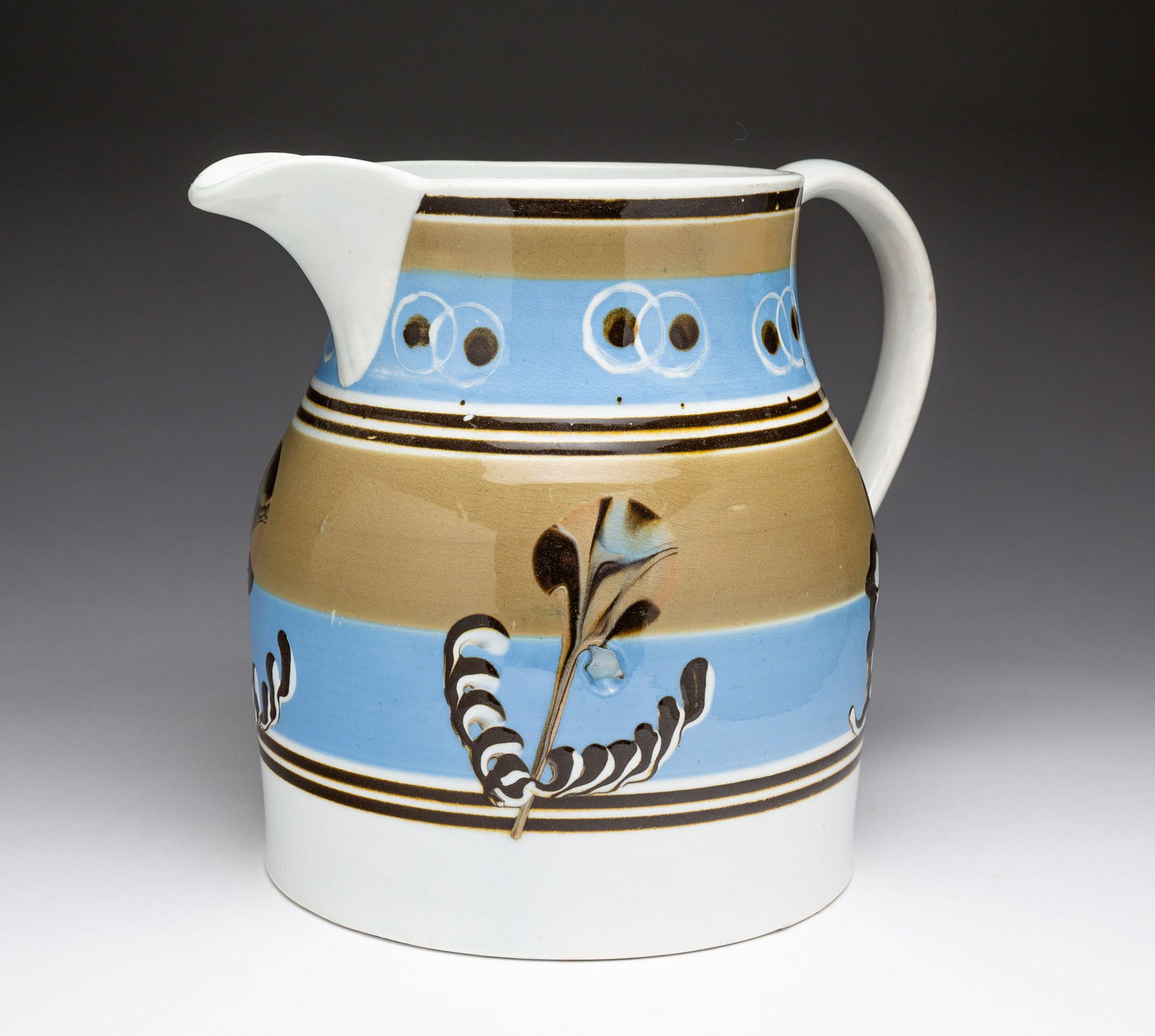 Mochaware Decorated Pitcher. Auction