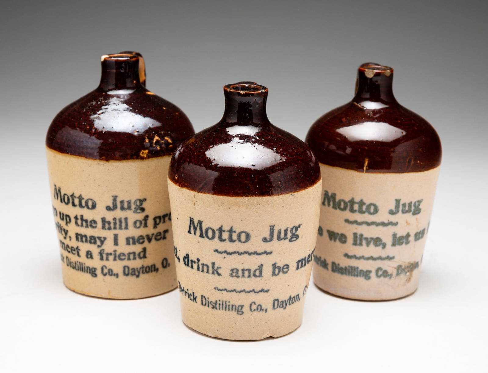 Three Detrick Whiskey Stoneware Mini Motto Jugs. Auction