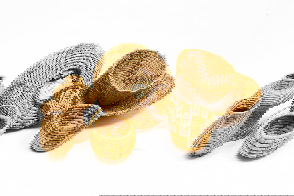 Seven Assorted First Nations Baskets. Auction