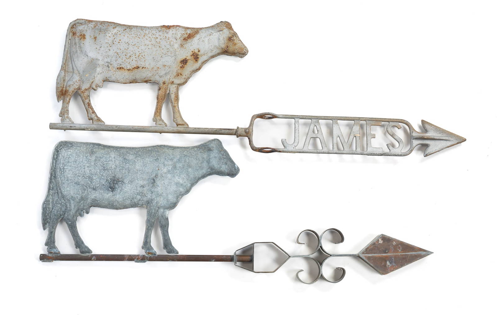 Two Figural Lightning Rod Directionals With Cows. Auction