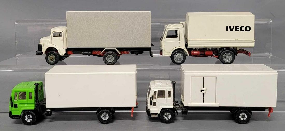 Four Diecast Delivery Box Trucks