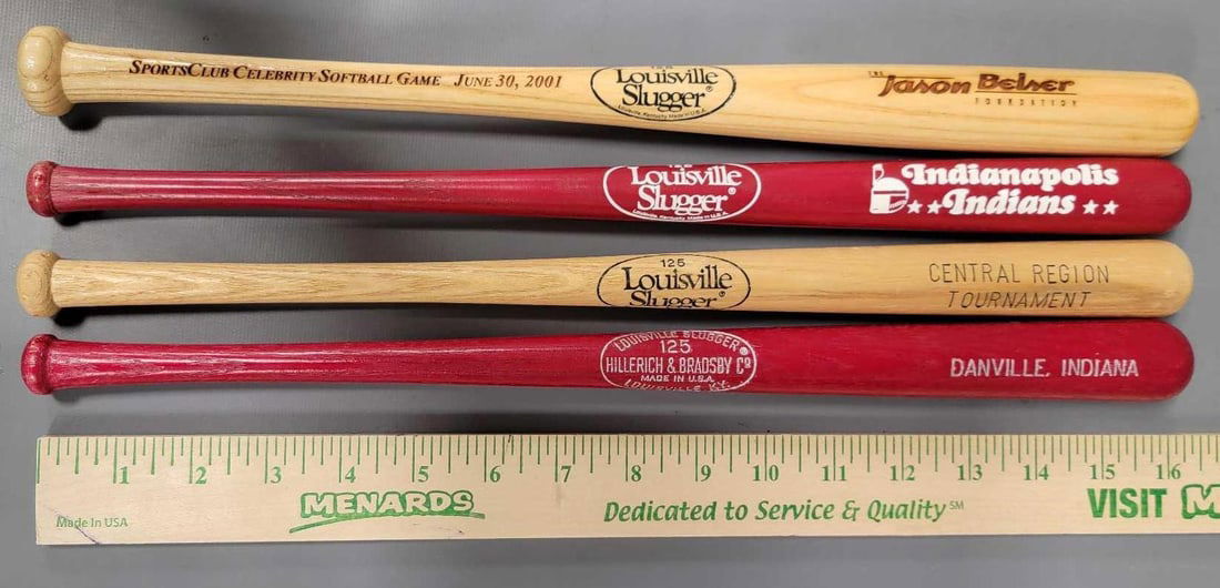 Four Miniature Louisville Slugger Baseball Bats Auction