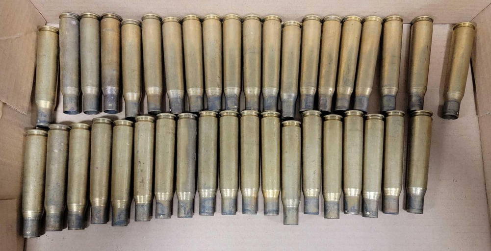 Thirty Nine Military 50 Caliber Spent Rounds