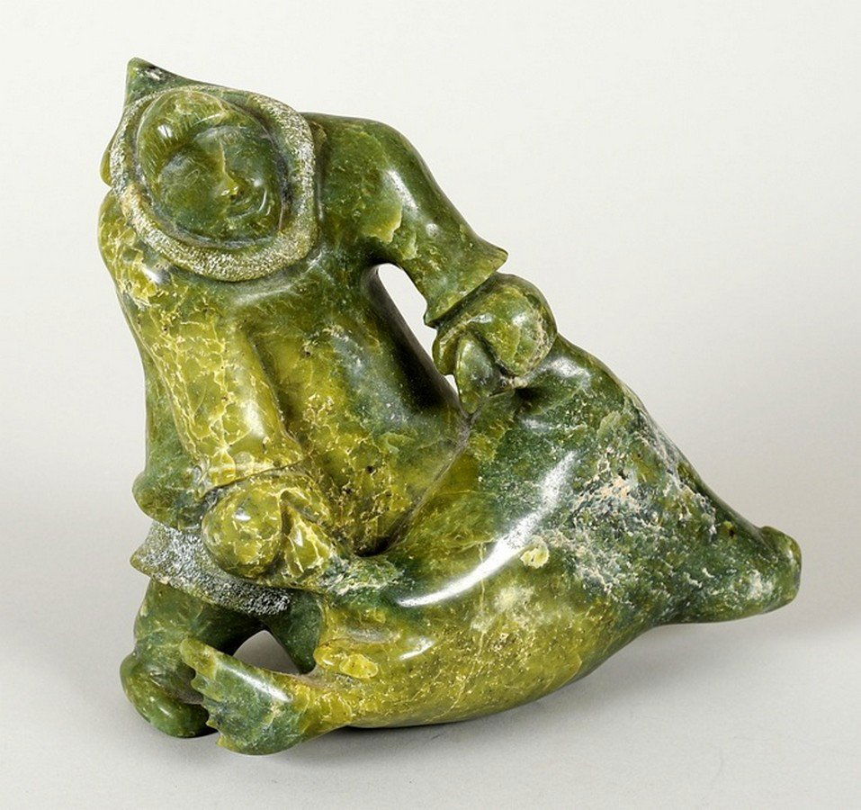 Inuit Steatite Carving Of A Man And Seal By Noah