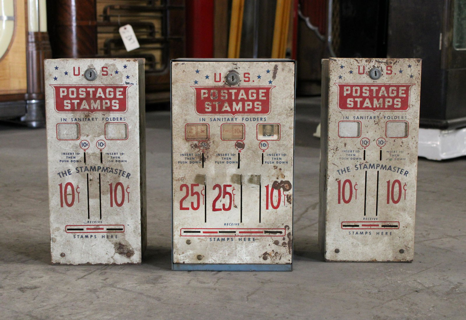 Three Postage Stamp Machines