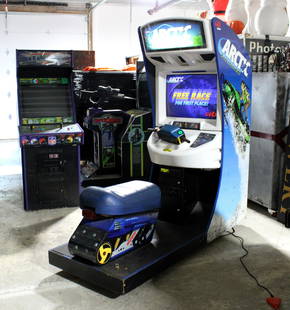 A Pair Of Midway Artic Thunder Snowmobile Driving Arcade Games.