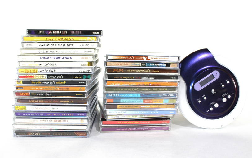 World Cafe CDs with Player (#0387) on Jan 05, 2023 | Jaybird Auctions in MD
