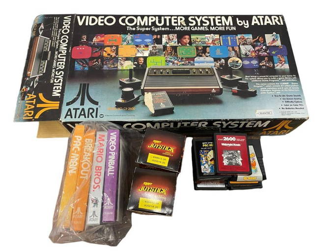 Atari Model Cx 2600, Pac Man , Mario Bros And More
