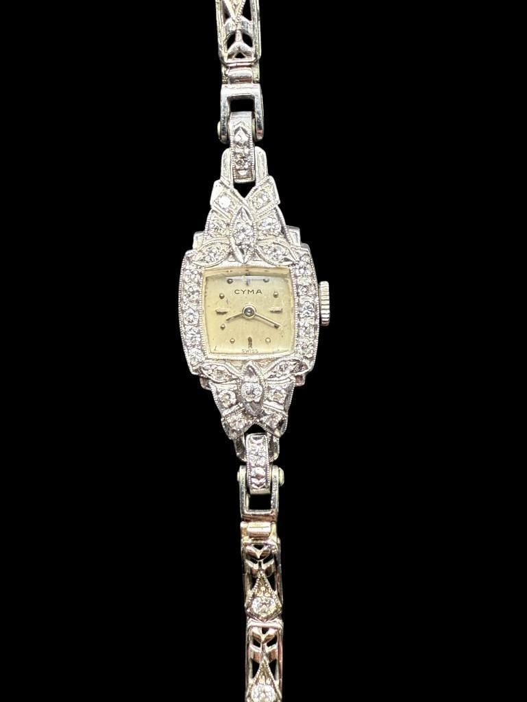 Cyma Platinum Watch With 14k Gold Band Auction