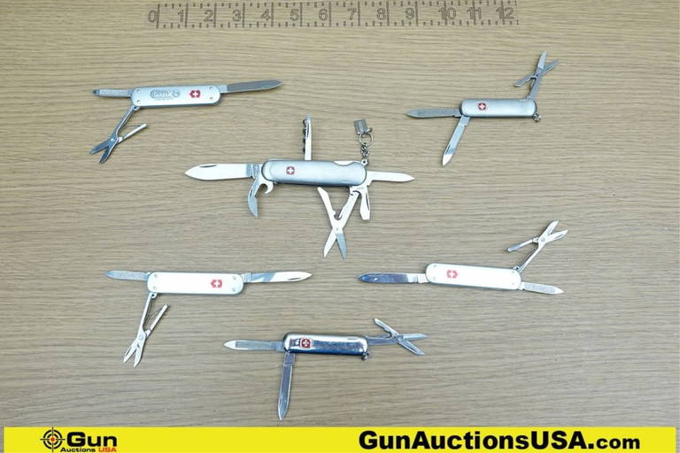 Wenger, Victorinox Multi Tools. Very Good. 6 Assorted Pocket Sized Multi Tools.. (73367) (gscm76)