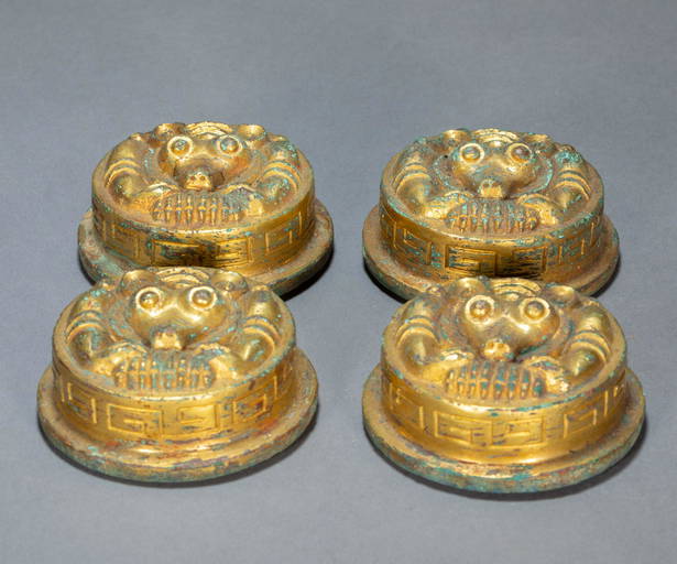 Four Ancient Chinese Gilt Bronze Paperweights