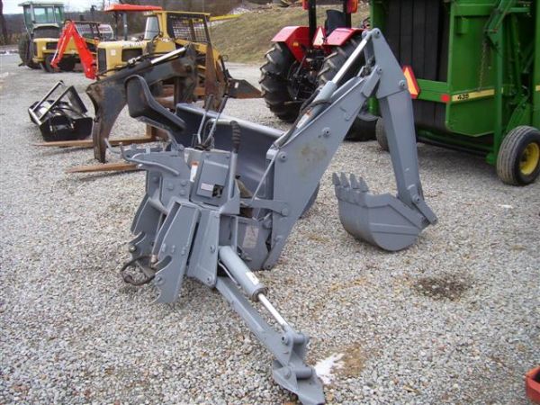 202: BRADCO 9L BACKHOE ATTACHMENT FOR GEHL SKID STEERS