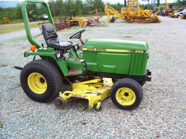 1233: JOHN DEERE 855 4WD TRACTOR W/ 60" BELLY MOWER