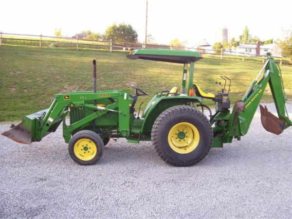 144: JOHN DEERE 970 4WD TRACTOR WITH LOADER / BACKHOE