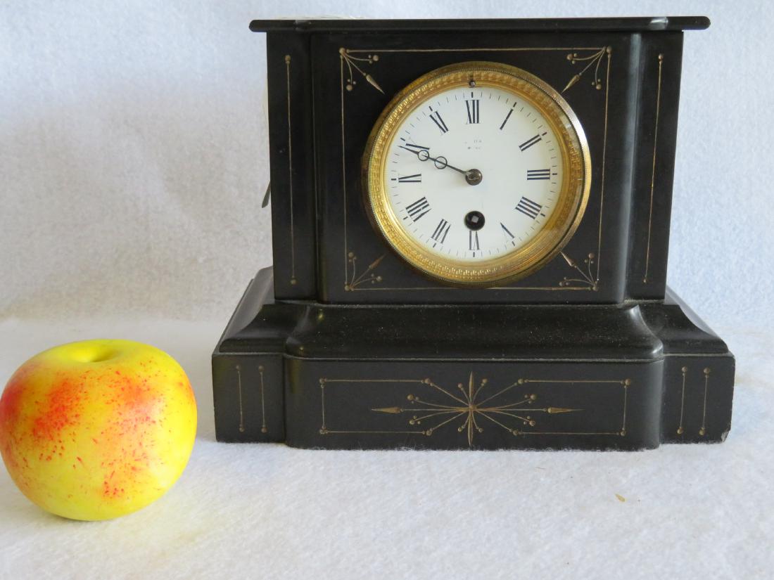 Victorian black slate mantle clock with Eastlake