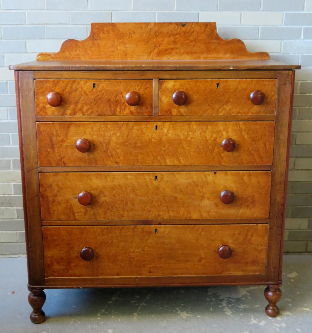Country Sheraton 5 drawer chest having a birdseye maple