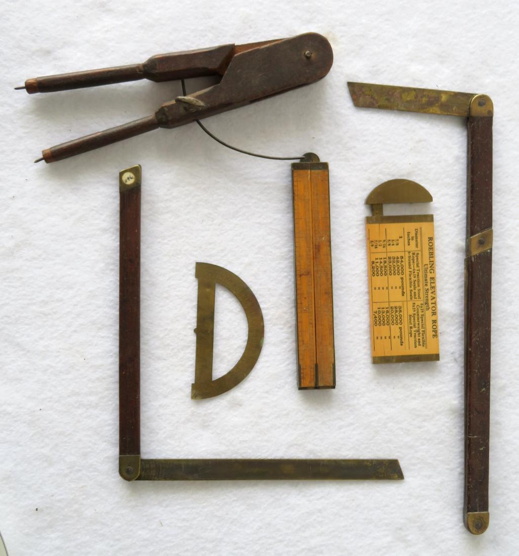 Six vintage measuring devices including a primitive