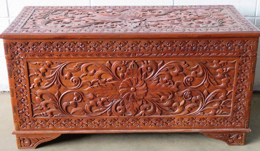 Profusely Carved Wooden Hope Chest Decorated With