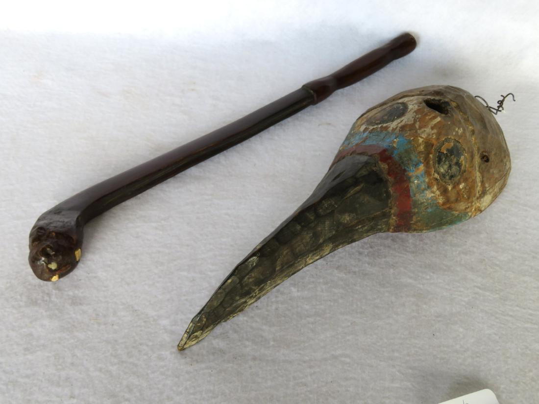 Two indigenous peoples wooden artifacts including a