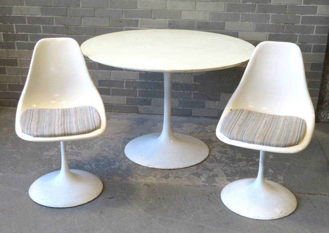 Mid-century modern white tulip table with laminated