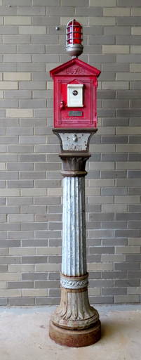 A Cast Iron Gamewell Lighted Fire Alarm Box Mounted On