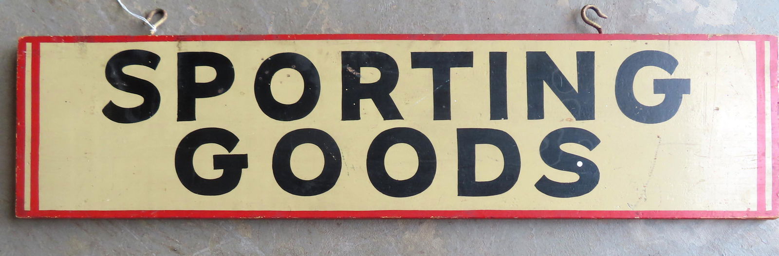 A wooden "SPORTING GOODS" double sided sign in very good condition in ...