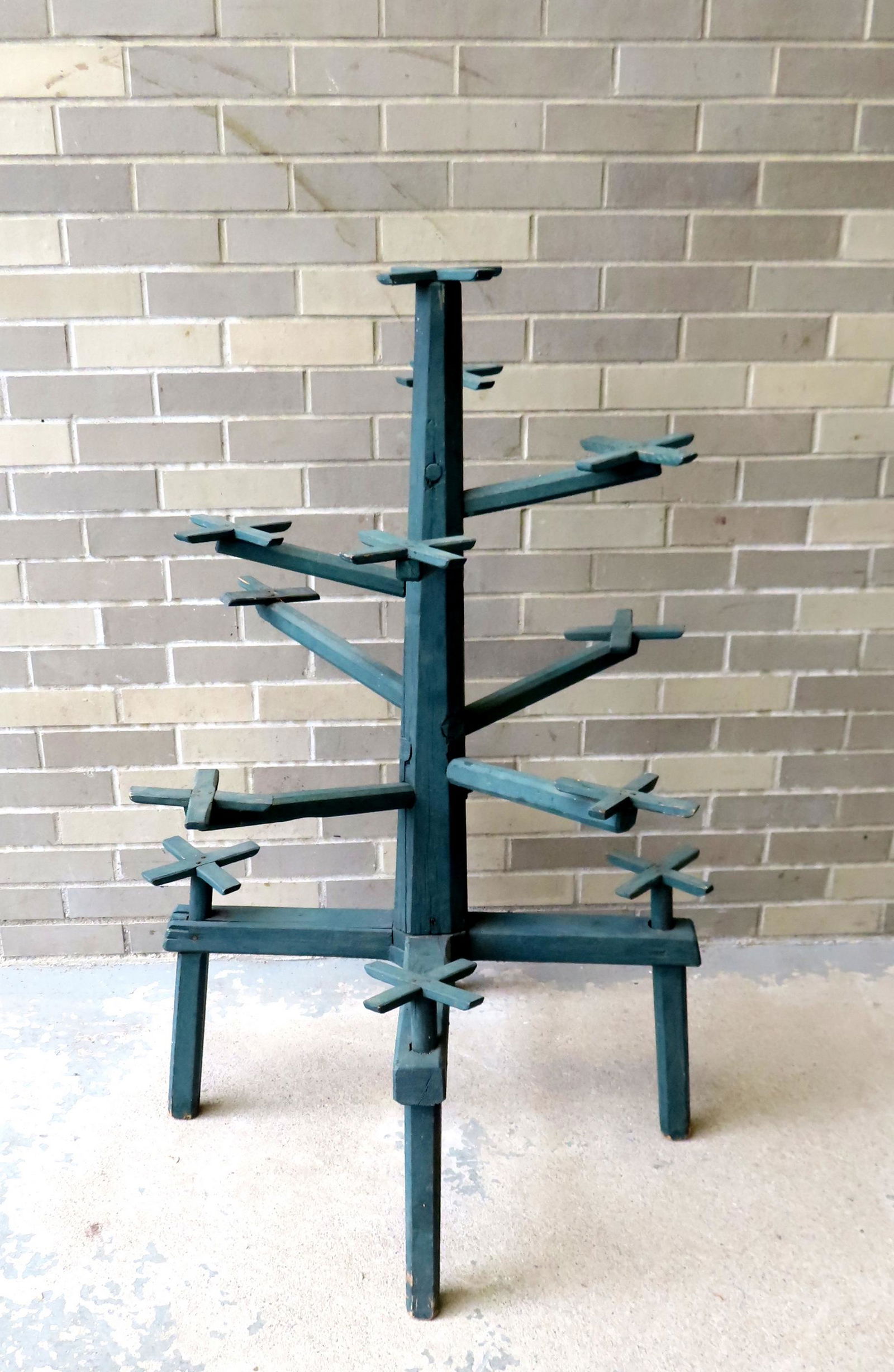 A Primitive Folk Art Country Store Display Stand Having 12 Arms And ...
