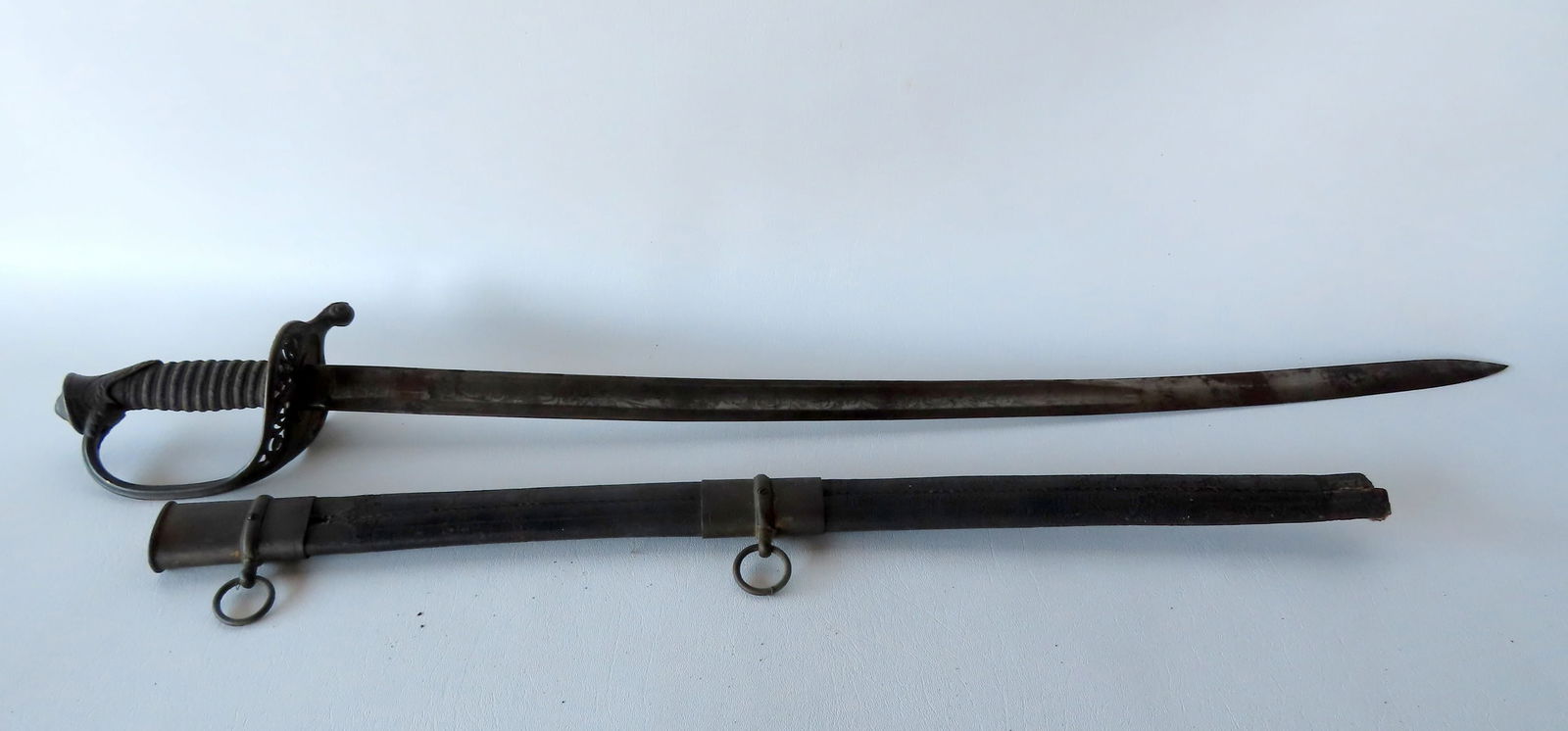 A Civil War Officer's Sword With Engraved Blade Marked "us". Also ...