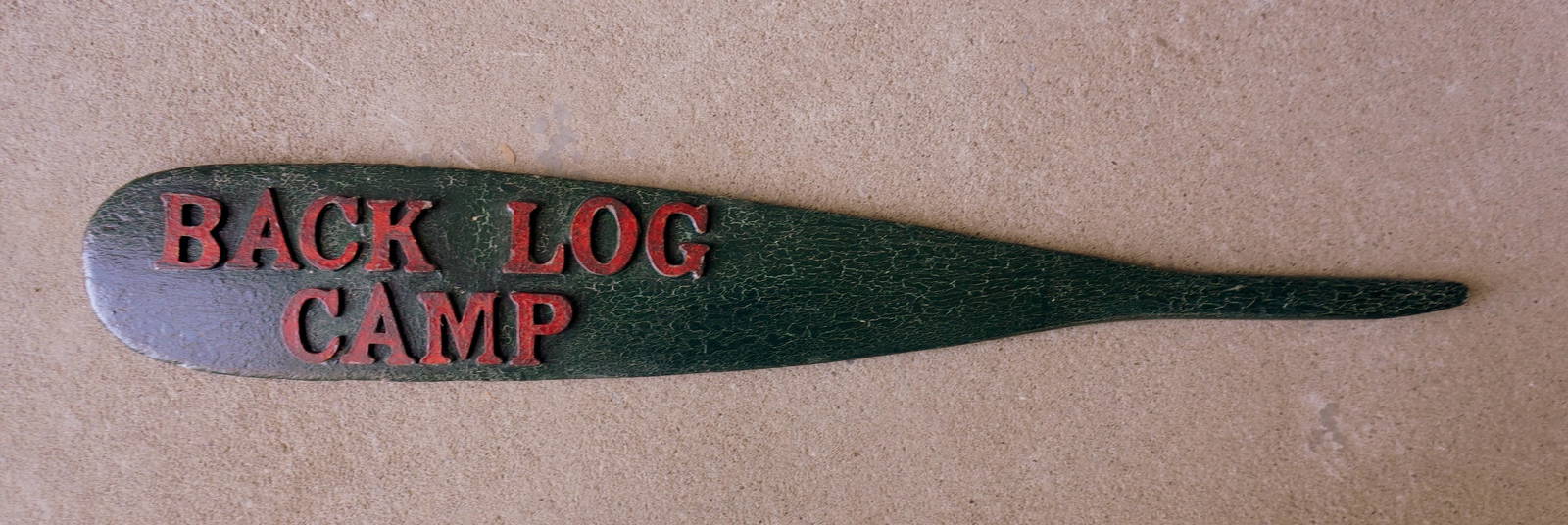 A Camp Sign In The Form Of A Canoe Paddle (fragment) Marked With ...