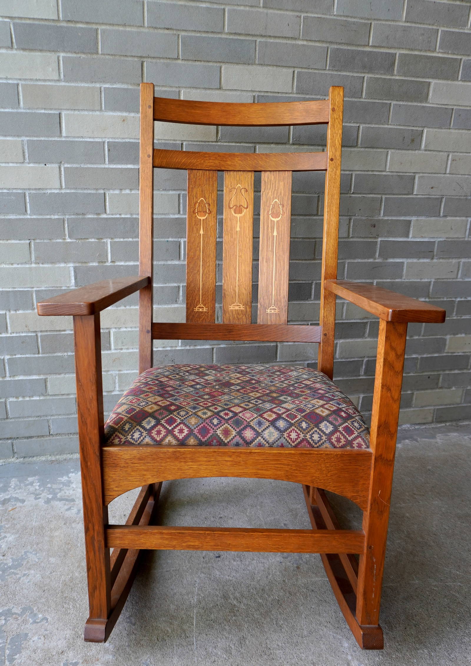 A Harvey Ellis Style Oak Rocker Having Stylized Floral Inlays On Back ...