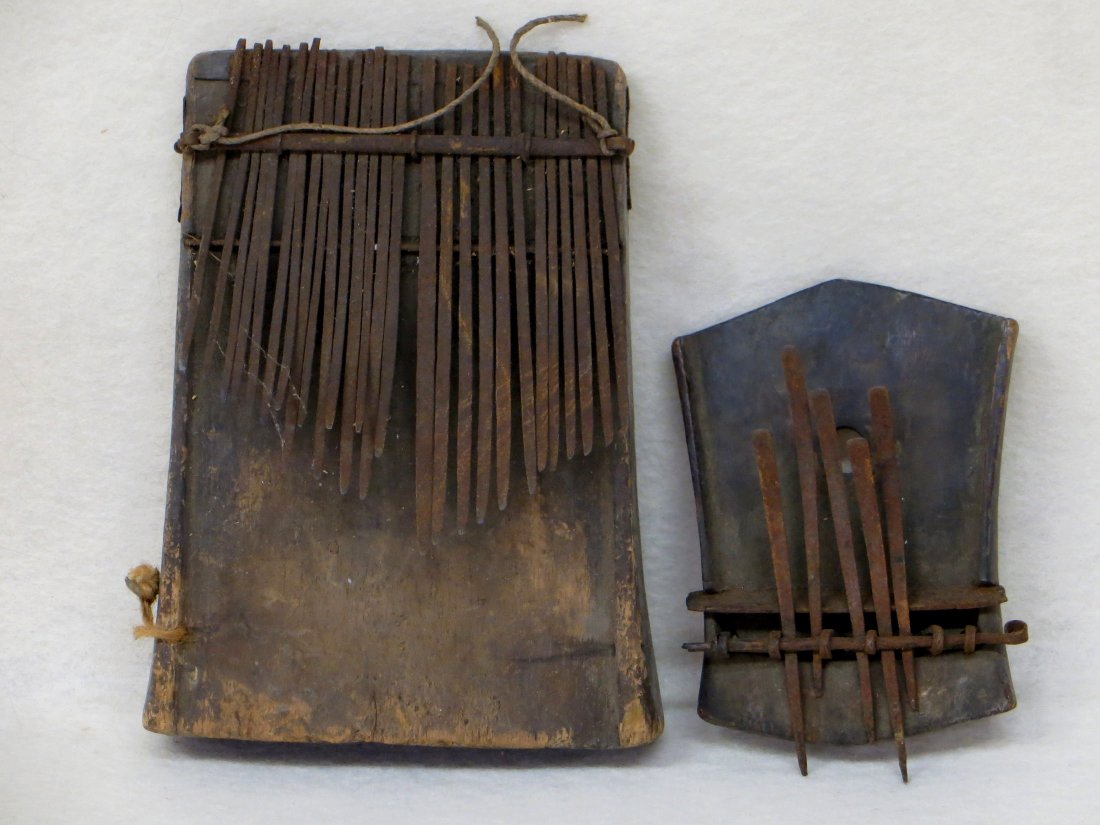 Two Primitive Wood And Metal Musical Instruments