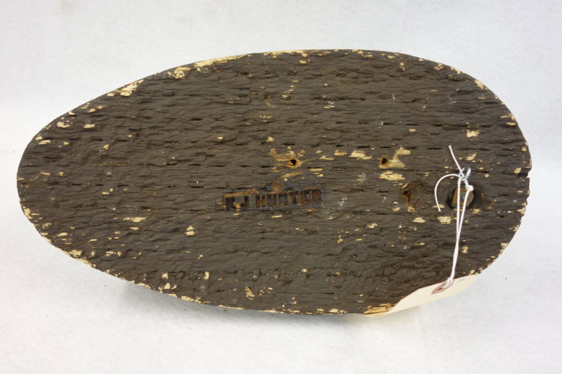 Sleeping black duck balsa wood decoy with glass eyes