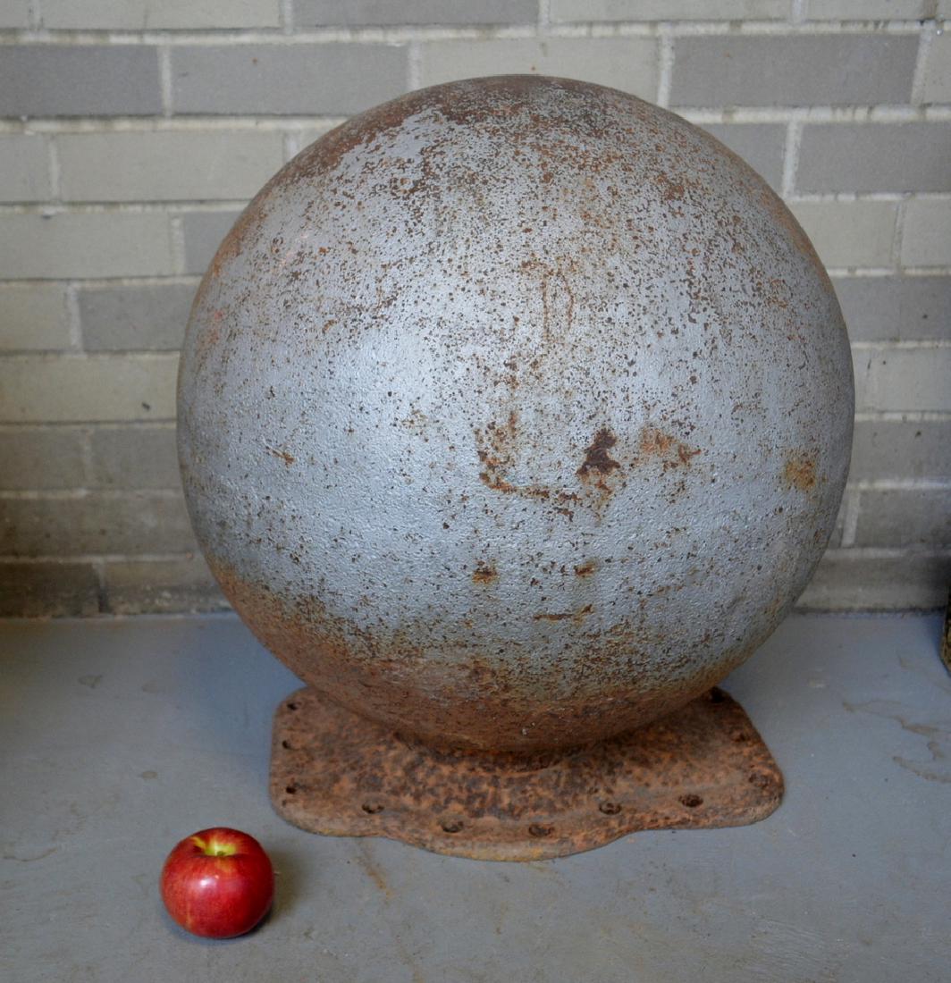 Large cast iron architectural sphere in old gray paint